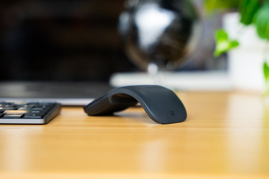 Microsoft Arc Mouse | Pack Hacker